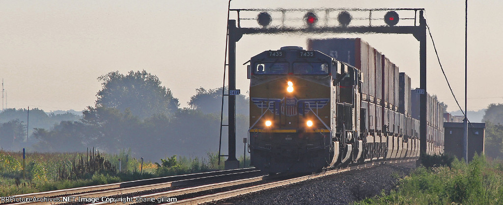 UP 7435 leads another stack train wb under the old atsf lights.